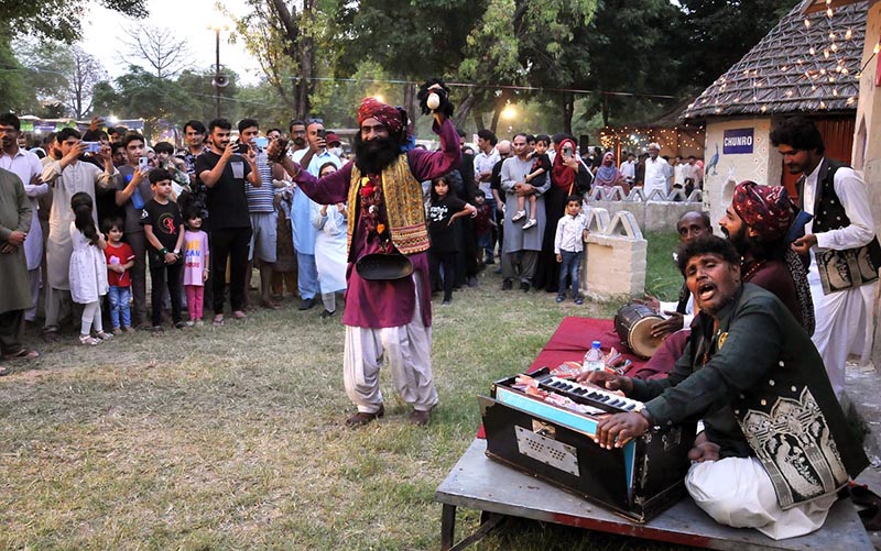 Artist performing balochi cultural dance during Saqafati Mela promoting ...