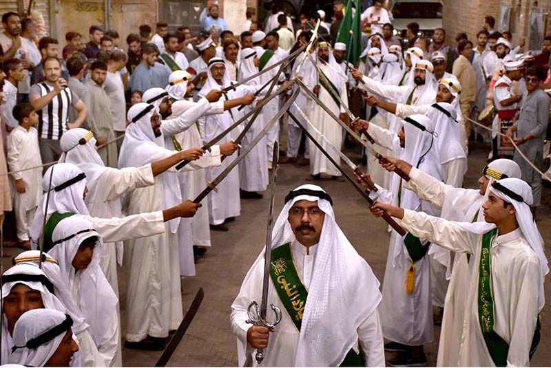 Youngsters in Arabic costumes participating in a rally celebrating the ...