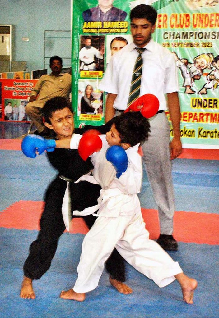 Female Karate Players Playing Karate Match during the Boys and Girls Junior Karate Championship ...