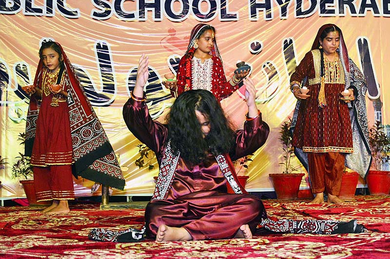 Students are performing the tableau on stage during Shah Latif day ...