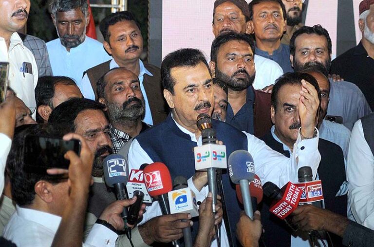 Former Prime Minister Syed Yusuf Raza Gilani addressing the PPP workers ...