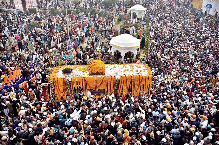 A large number of Sikh yatrees performing their religious rituals on the occasion of 554th birth ...