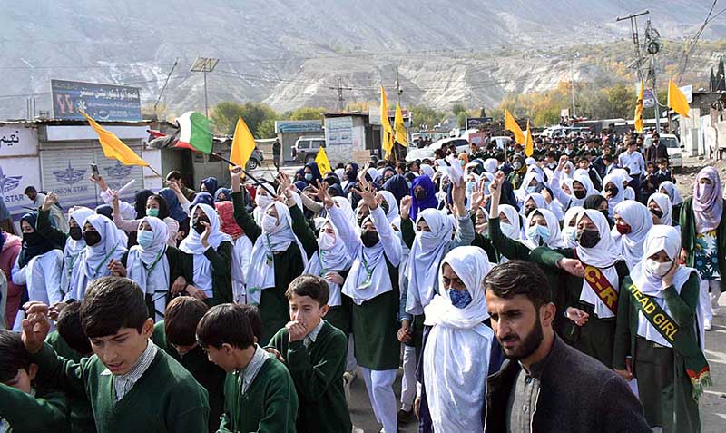 Students of different Schools and Colleges hold placards during a pro ...