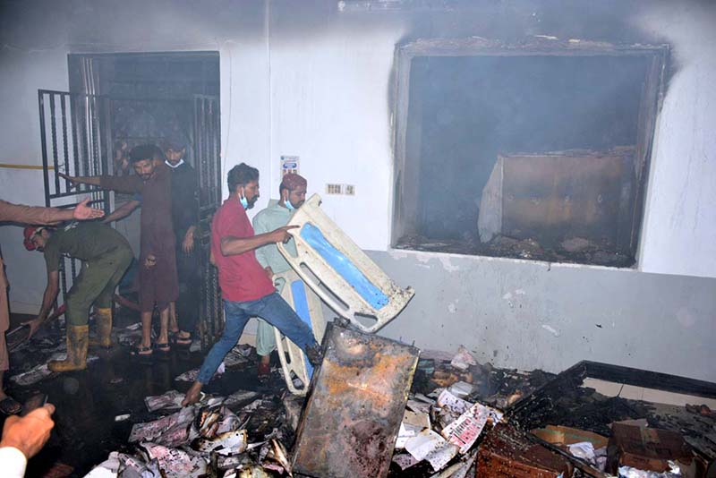 Firefighters struggling to extinguish fire in store room of kidney ward ...