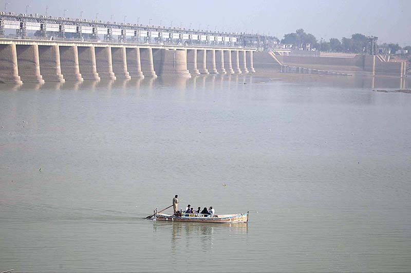 A family enjoying the boat ridding at Indus river