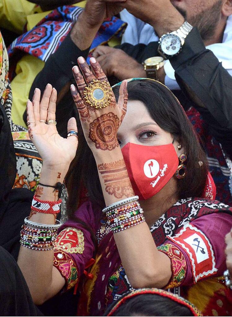 Folk singer performing Sindhi song during celebration of Sindhi Ajrak ...