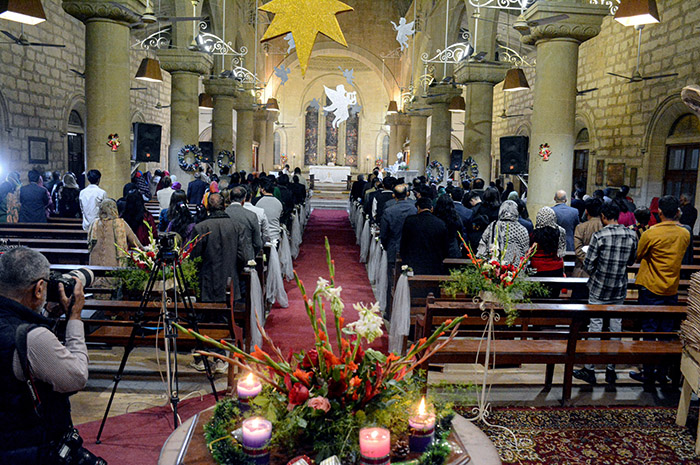 Christian community members performing religious rituals on Christmas ...