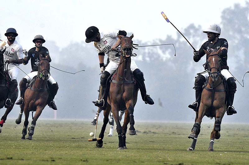 Players struggling to get hold on the ball during match between Rijas ...