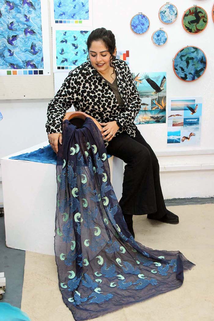 A student viewing creative work during Annual 18th Degree Show at SABS ...