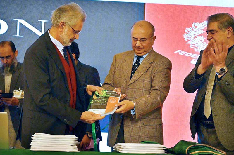 Mr.Justice Syed Mansoor Ali Shah presenting a copy of FJA Vision to Hon ...