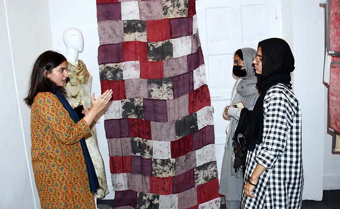 Visitors viewing creative work during 18th Annual Degree Show at SABS ...
