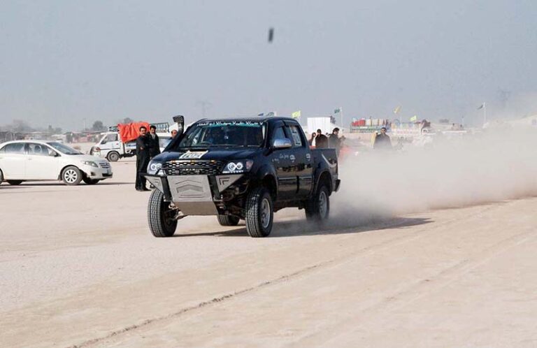 Racing jeeps in action during 19th TDCP Cholistan Desert Jeep Rally 2024