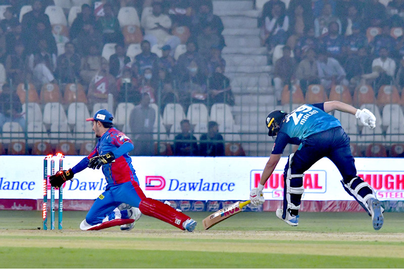 Karachi Kings wicketkeeper Saad Baig trying to run out the Multan ...