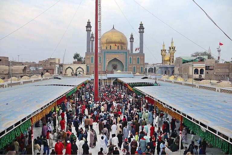 Devotees performing dhamal at the shrine of Hazrat Lal Shahbaz Qalandar ...