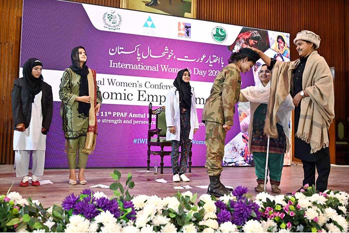 Students performing on stage in drama during National Women Conference ...