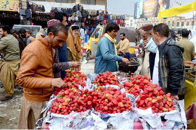 People purchasing Jalabies and other food items for Iftar at Prince Road