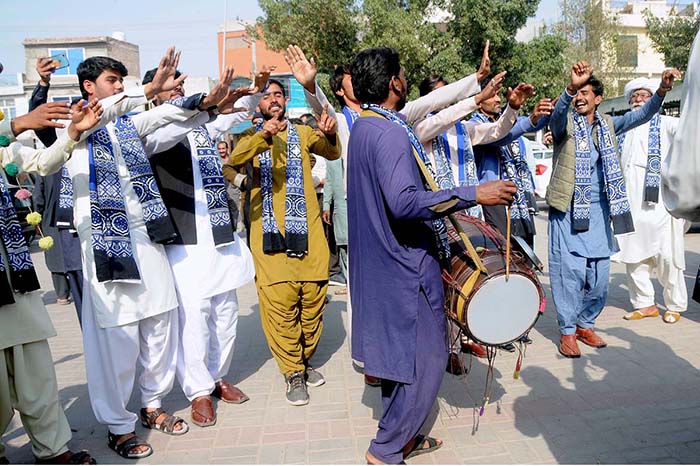 Saraiki people performing traditional dance Jhumar during celebrations ...