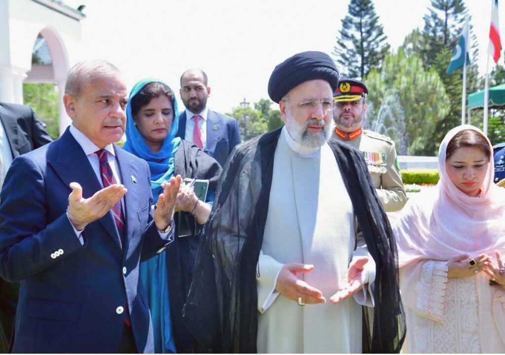 Prime Minister Muhammad Shehbaz Sharif and Iranian President H.E. Dr. Syed Ebrahim Raisi plant a ...