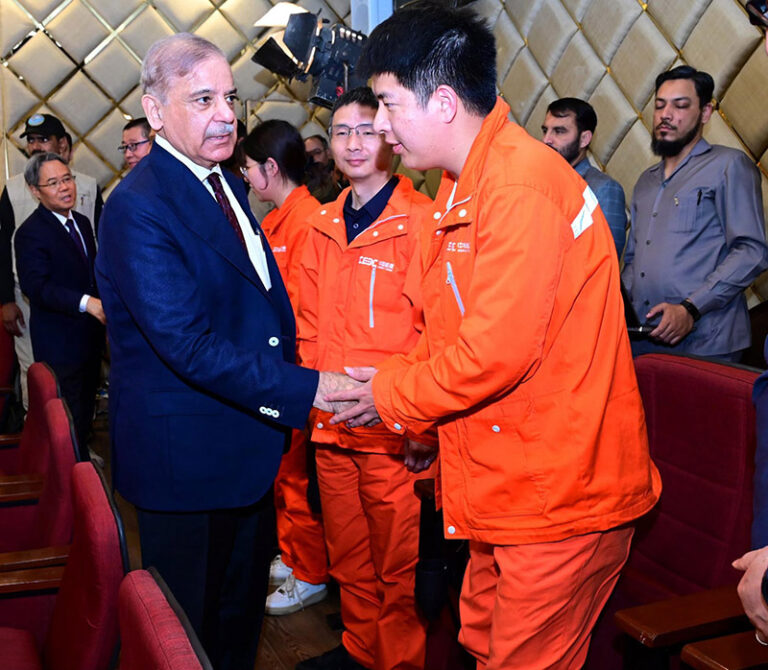 Prime Minister Muhammad Shehbaz Sharif interacts with engineers of the ...