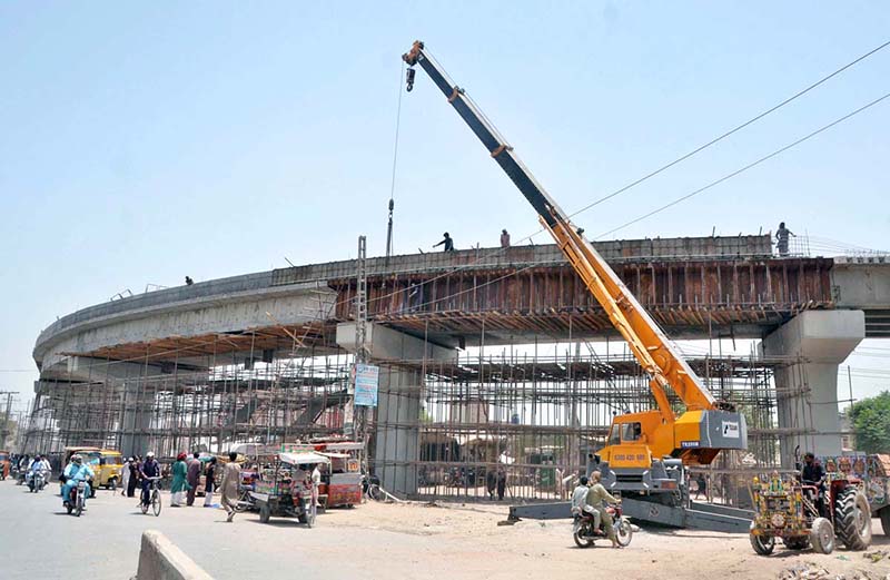 A view of construction work of flyover underway at Industrial State during development work in ...
