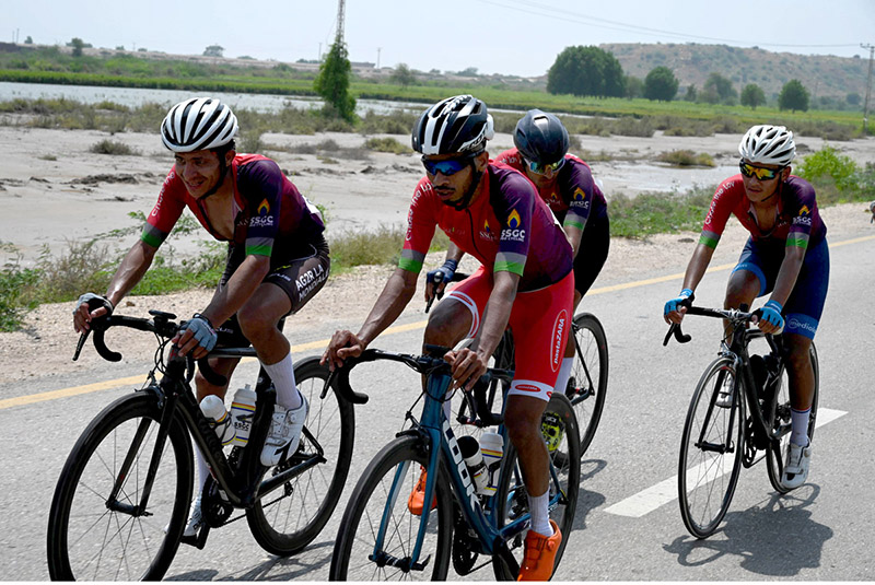 Cyclists participating in a Cycle Race from Karachi to Jhampir on ...