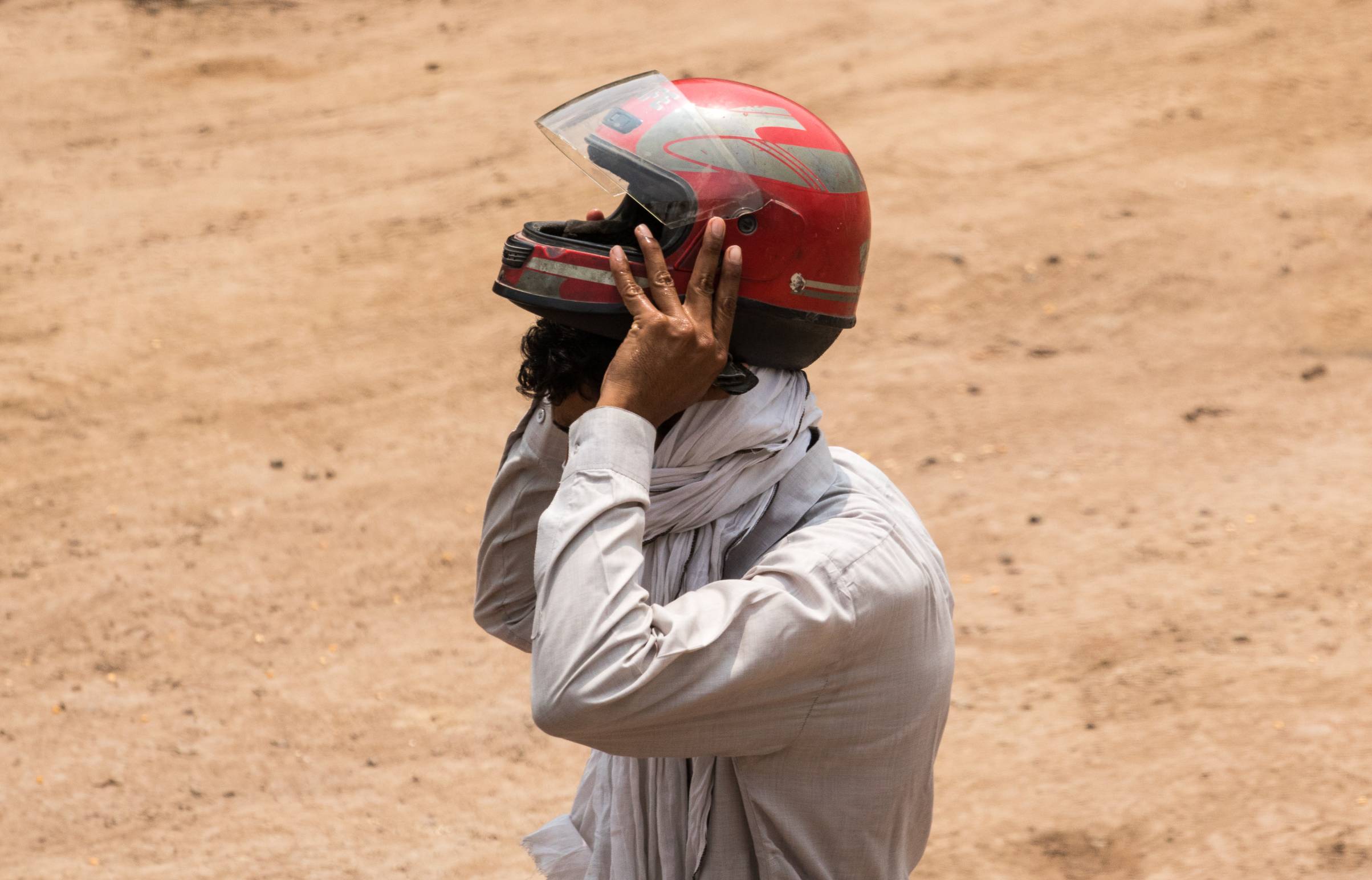 Motorcycle riders without helmet, licence to face a double fine