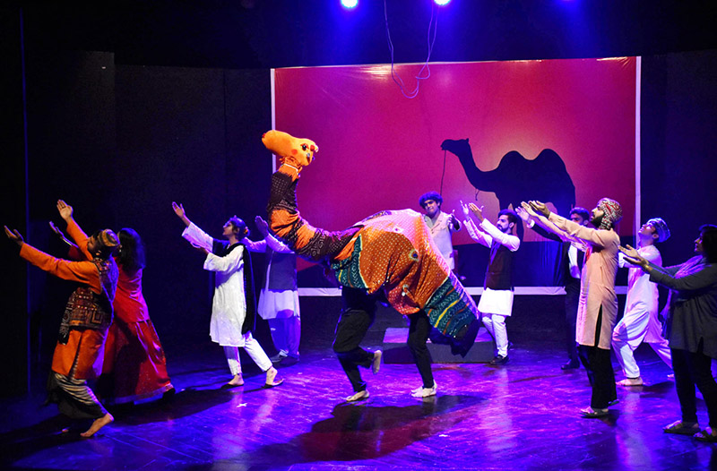 Ajoka workshop artist students performing on the stage in a play titled ...