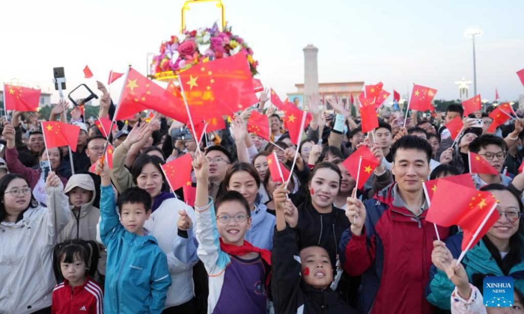 Chinese celebrate National Day with patriotism, pride and confidence